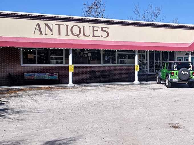That bold "ANTIQUES" sign isn't subtle, and honestly, we respect the confidence enormously.