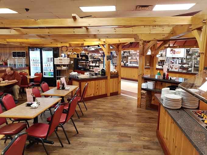 Warm wooden beams, red chairs, and the smell of home cooking. Your grandmother would approve.