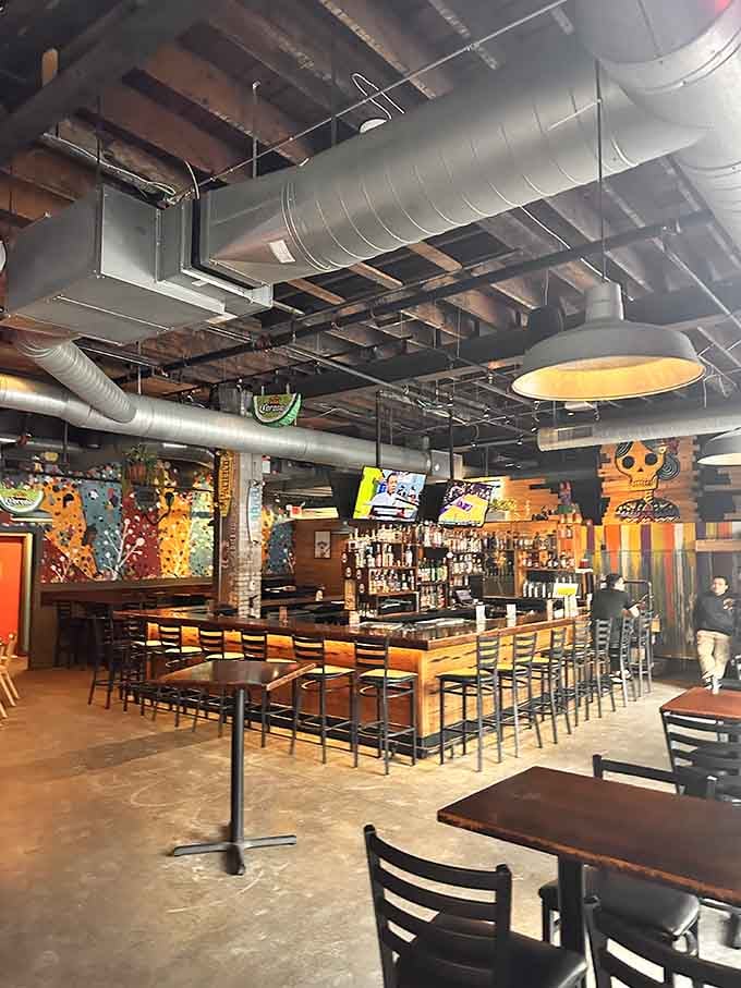Exposed ductwork, colorful murals, and a full bar. This room means serious business while somehow staying completely relaxed.