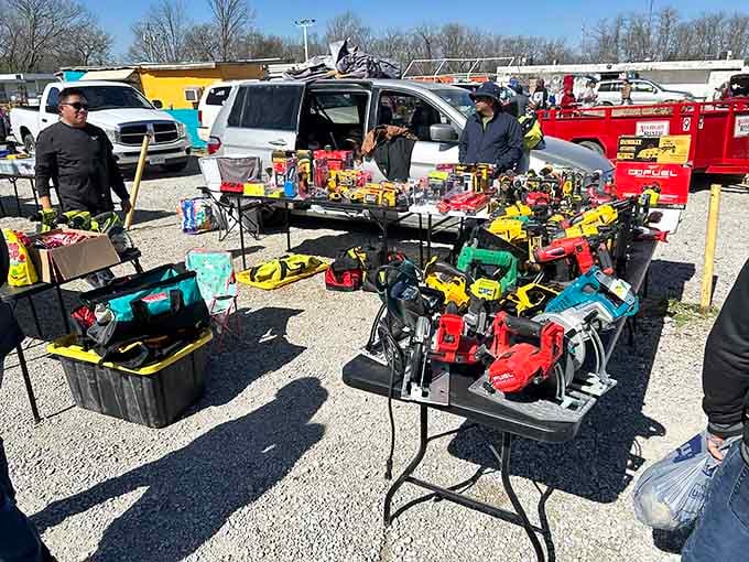 A power tool lover's dream laid out on folding tables, with DeWalt, Milwaukee, and Makita all showing up to the party.