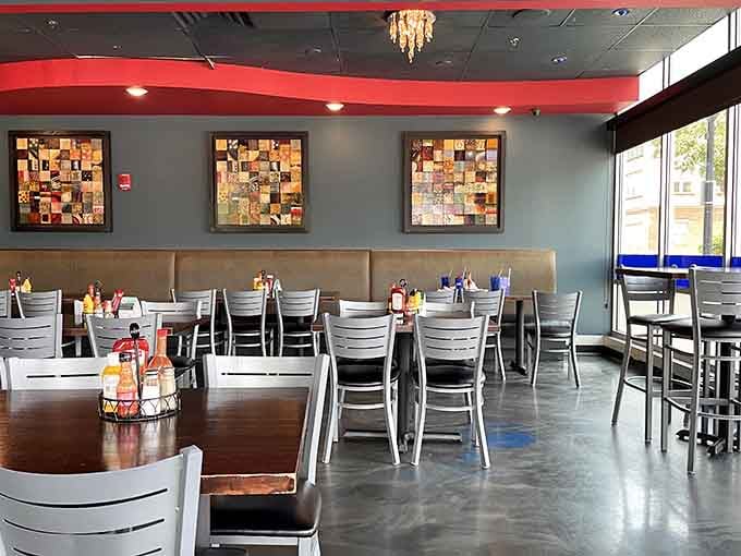 Clean lines, warm booths, and hot sauce already on the table. Someone here really understands people.