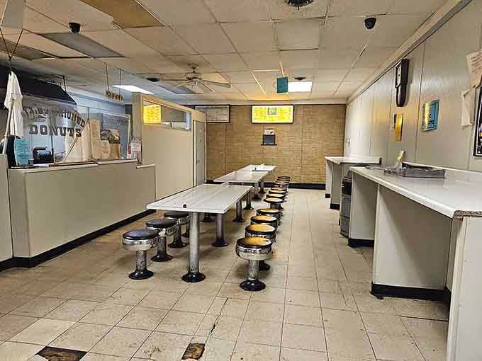 Simple stools, long white tables, and zero pretension. This is where good mornings are made.