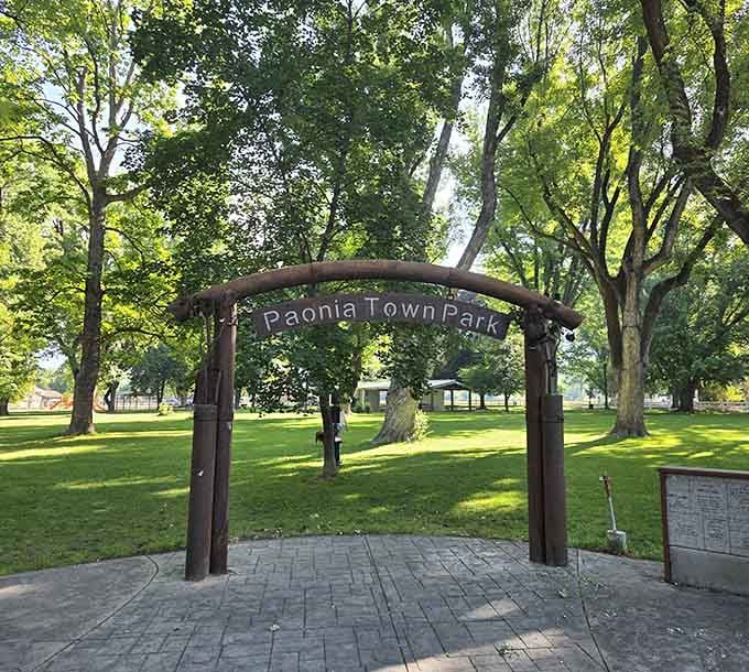 Paonia Town Park's welcoming arch says it all: come in, slow down, and stay a while under these magnificent trees.