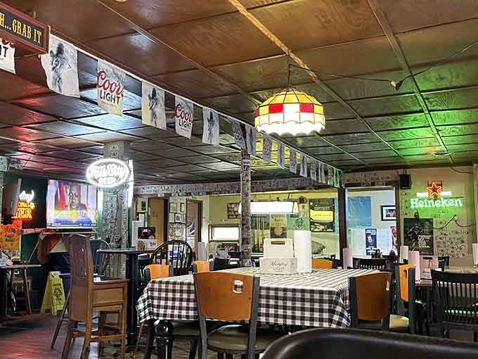 Neon signs, checkered tablecloths, and dark wood paneling, this room has more character than most five-star restaurants combined.