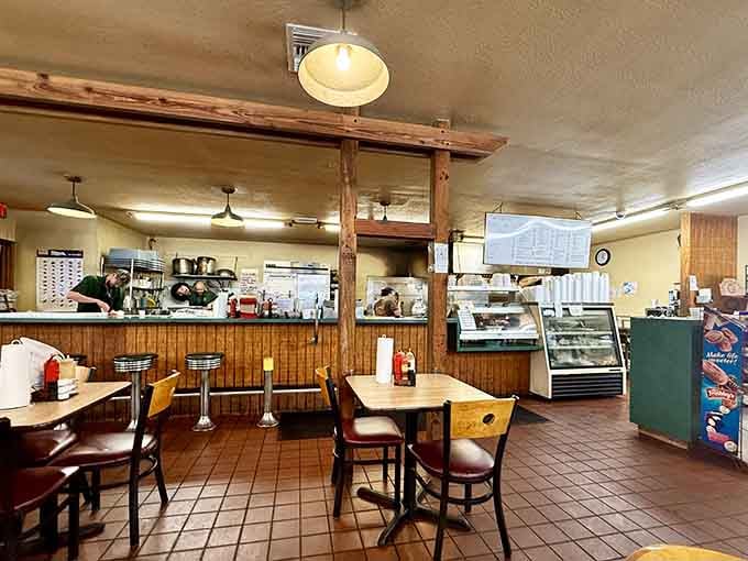 Wooden beams, counter stools, and the smell of smoked meat, this interior means serious business.