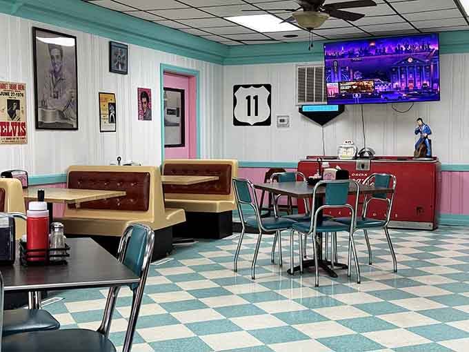 Checkered floors, Elvis on the walls, and a Route 11 sign that means you're exactly where you should be.
