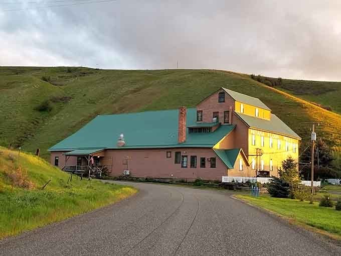 Golden evening light wraps around Pataha Flour Mill like a warm blanket, reminding you that some buildings earn their beauty through decades of honest work.