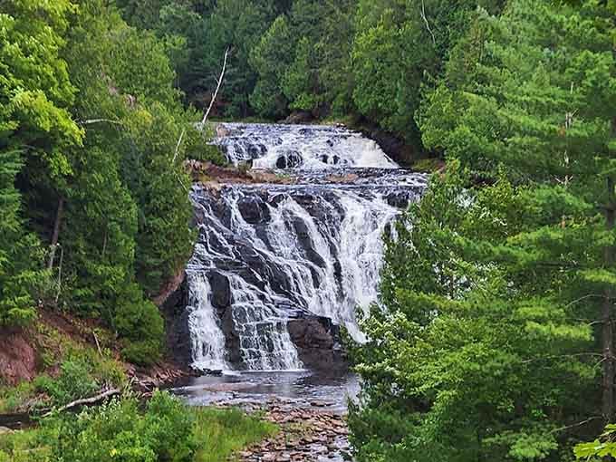 Framed by towering pines, these cascading falls prove Wisconsin has been holding out on us all along.