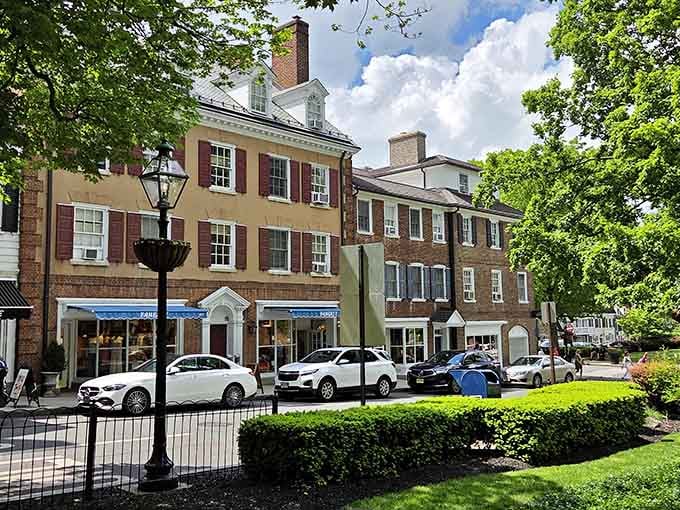 Palmer Square's Tudor buildings compete for "Most Likely to Appear on a Postcard" while locals casually grab coffee.