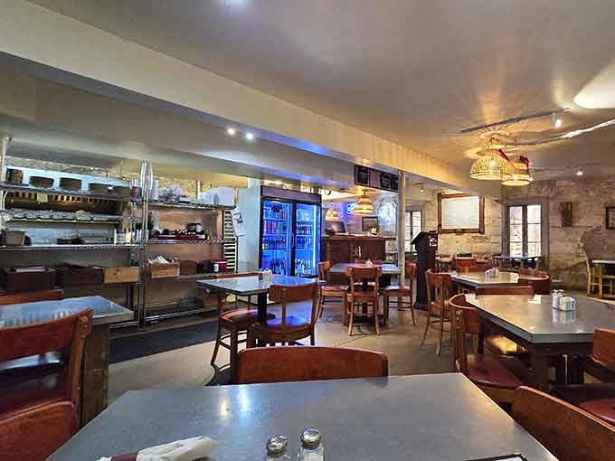 Stone walls and modern comfort blend seamlessly in this underground dining room that's stood the test of time.