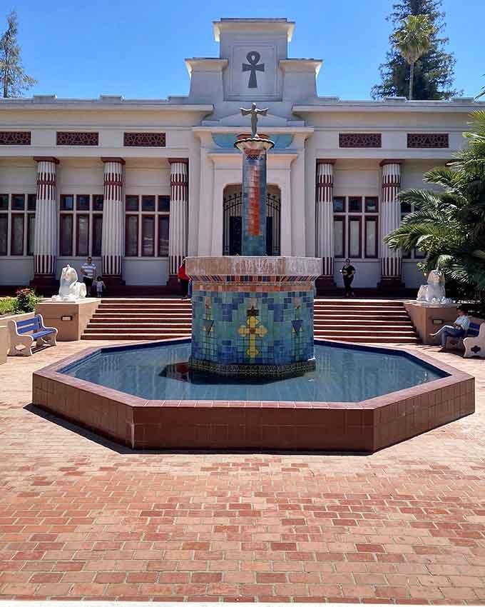 The entrance courtyard sets the mood perfectly, with sphinx guardians and a mosaic fountain that says, "You're not in Kansas anymore."