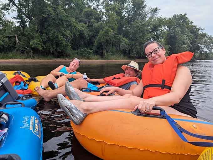 This is what "letting go" actually looks like. Feet up, worries gone, river doing all the work.