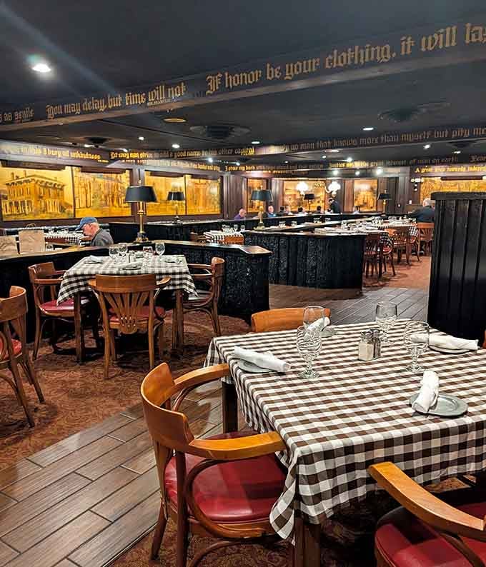 Black and white checkered tablecloths, golden murals, and wisdom painted on the walls. Dinner and philosophy, together at last.