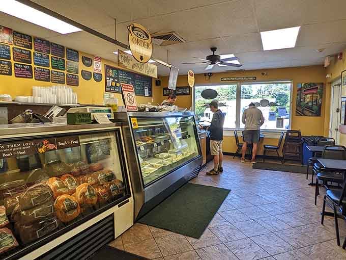 Sunny yellow walls, chalkboard menus, and Boar's Head meats in the case. This is what a great lunch spot actually looks like.