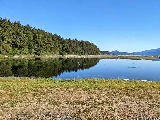 The lagoon's mirror-perfect reflection makes you wonder if nature's showing off or just really good at photography.