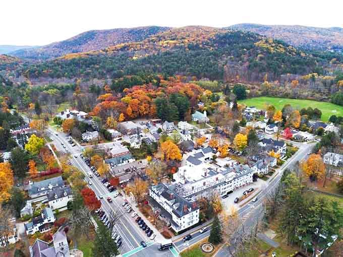 From above, Stockbridge looks like someone carefully arranged a perfect New England postcard among the hills.