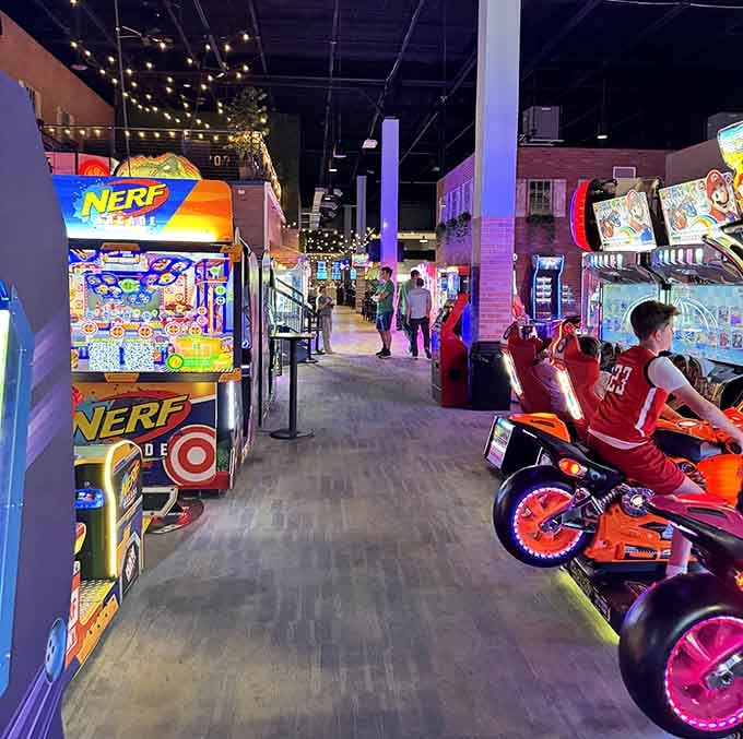 Row after row of glowing arcade machines, string lights overhead, and good times stretching as far as the eye can see.