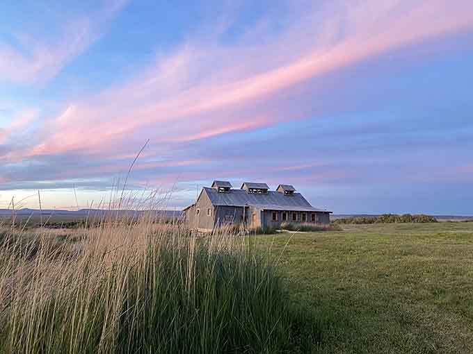 Sunset paints the sky while the bathhouse waits patiently to work its geothermal magic on weary travelers.