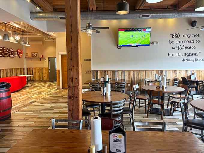 Bourdain's words on the wall, wooden beams overhead, and a paper towel roll on the table. You're in the right place.
