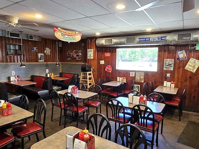 Wood paneling, red cushions, and Kansas City Royals pride. This room has personality you simply can't manufacture.