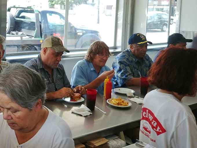 Strangers become regulars fast here. Telway's counter brings Detroit together, one slider at a time.