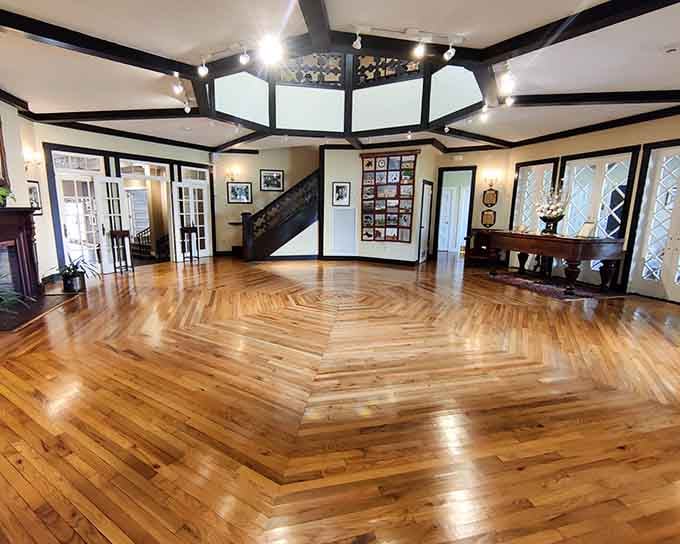 That floor isn't just wood, it's a geometric masterpiece that'll stop you mid-stride every single time.