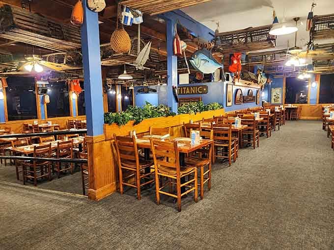 Maritime memorabilia meets serious eating space, where every table feels like your own private corner of the ocean.