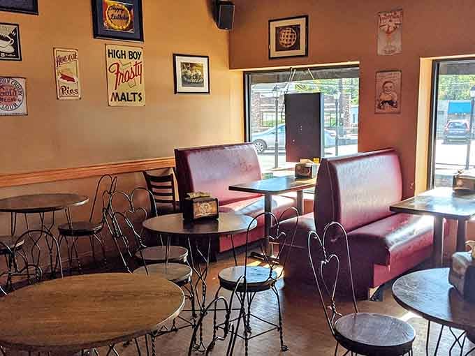 Red vinyl booths, wrought iron chairs, and vintage signs that whisper, "Stay a while, friend."