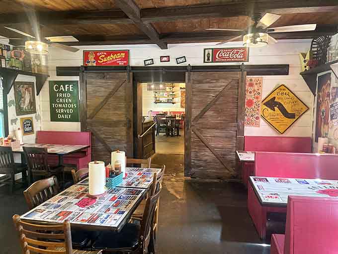 Step inside and let those pink booths, vintage signs, and barn doors tell you everything you need to know about this place.