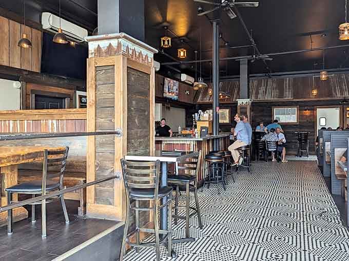 Reclaimed wood, bold tile floors, and warm amber lighting. Somehow rustic and cool at the exact same time.