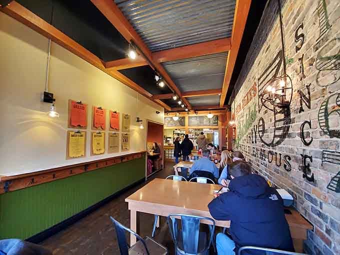Industrial chic meets comfort food heaven in a space that feels both modern and welcoming at once.