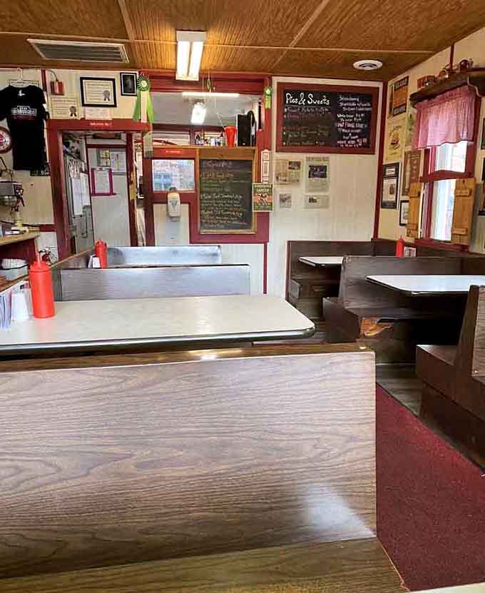 Six booths, warm wood paneling, and chalkboard menus that feel like a love letter to honest, no-fuss dining.