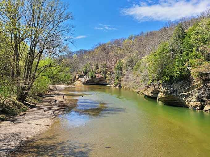 Sugar Creek carves through sandstone bluffs like it's been practicing this masterpiece for thousands of years.