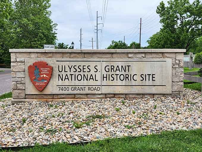 That stone-framed National Park Service sign means you've officially arrived somewhere worth every single mile of the drive.