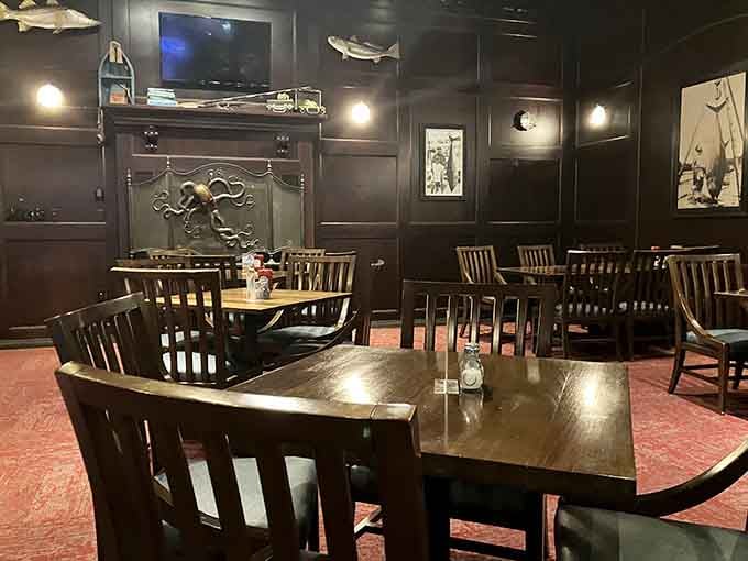 Dark wood, warm light, and an octopus sculpture on the wall, this dining room means serious, unhurried business.