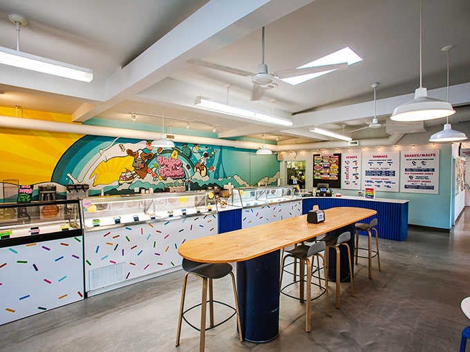 Bright walls, a playful mural, and a sprinkle-covered counter. This is what happiness looks like on the inside.