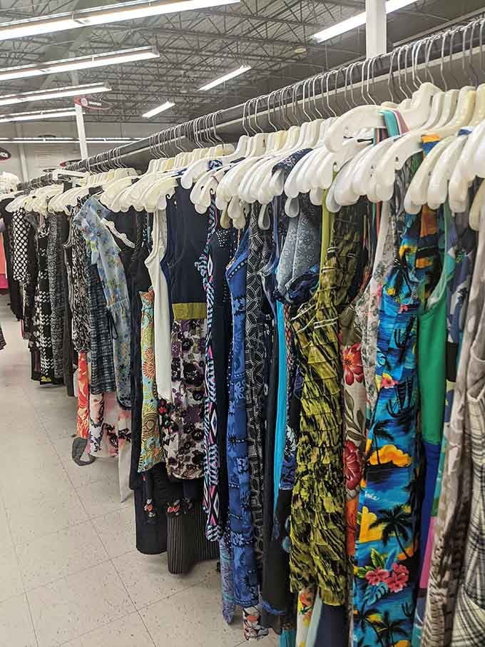 Row after colorful row of dresses, from tropical prints to classic black, all waiting for their next adventure.