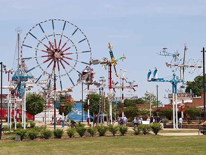 When the breeze picks up, every single one of these towering kinetic sculptures comes alive at once.
