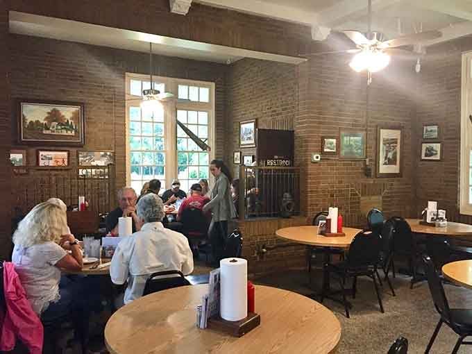 Exposed brick walls, railroad artwork, and the hum of happy diners. This room has been telling stories for decades.