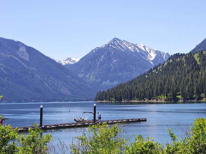 That dock knows exactly what it's doing, photobombing every perfect mountain reflection like a natural-born scene stealer.