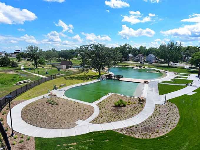 From up here, Webber Natural Swimming Pool looks less like a city park and more like a landscape painting come to life.