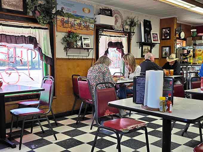 Classic checkered floors and vintage charm create the perfect backdrop for serious comfort food conversations and lingering coffee refills.