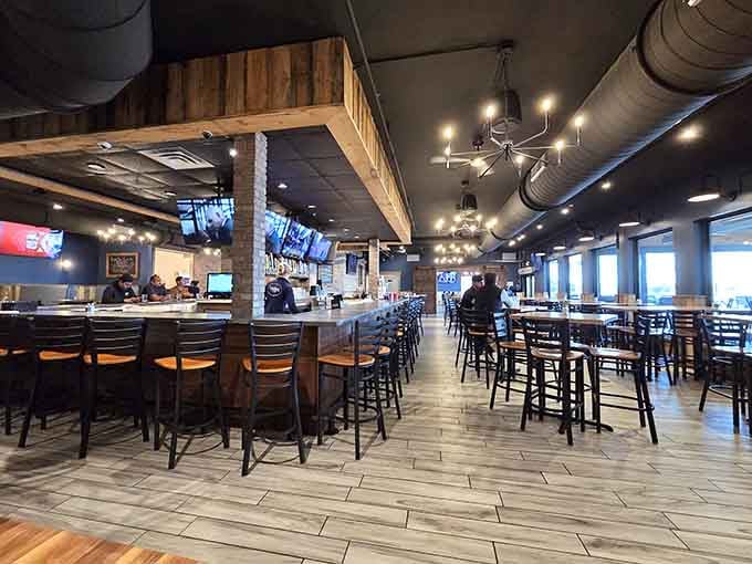 Warm wood, soft lights, and a bar that means business. This room says "stay a while" and you will.