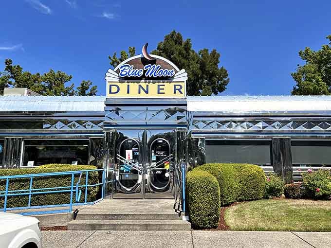 On a sunny Oregon day, the Blue Moon Diner's gleaming chrome facade shines like a brand-new Cadillac fresh off the lot.