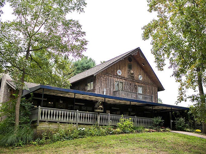 This rustic wooden chalet tucked under shady trees looks like Bavaria decided to visit Missouri.
