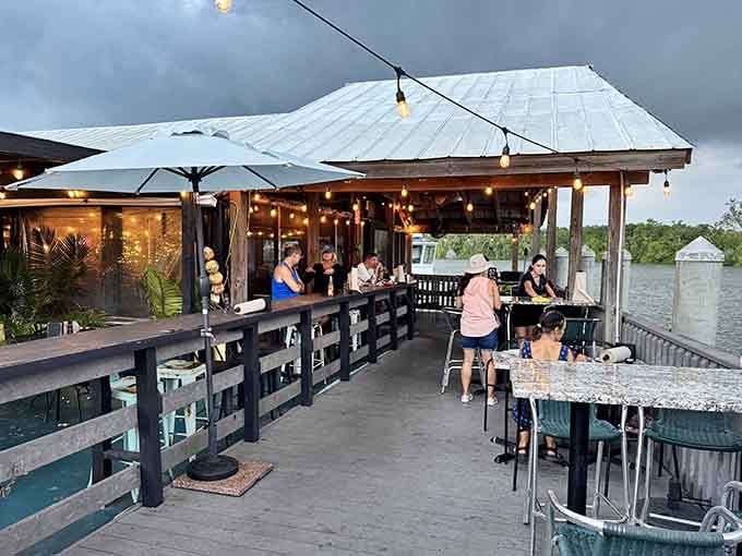 String lights, stormy skies, and fresh seafood on a canal deck &mdash; Camellia Street Grill makes moody look absolutely delicious.