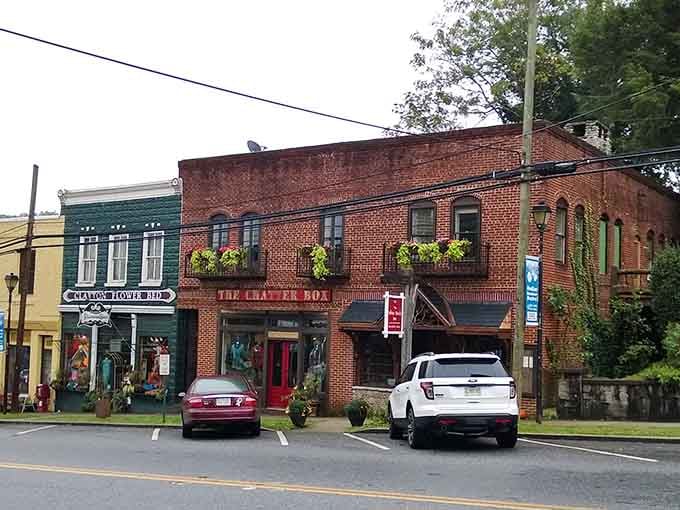 The Chatter Box's red door and flower-draped balcony make this Clayton brick beauty impossible to walk past.