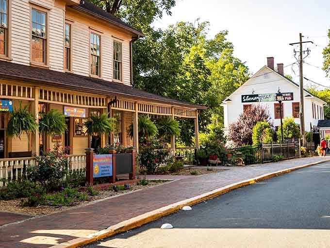 Historic storefronts with hanging ferns create the perfect setting for an afternoon of leisurely window shopping and discovery.