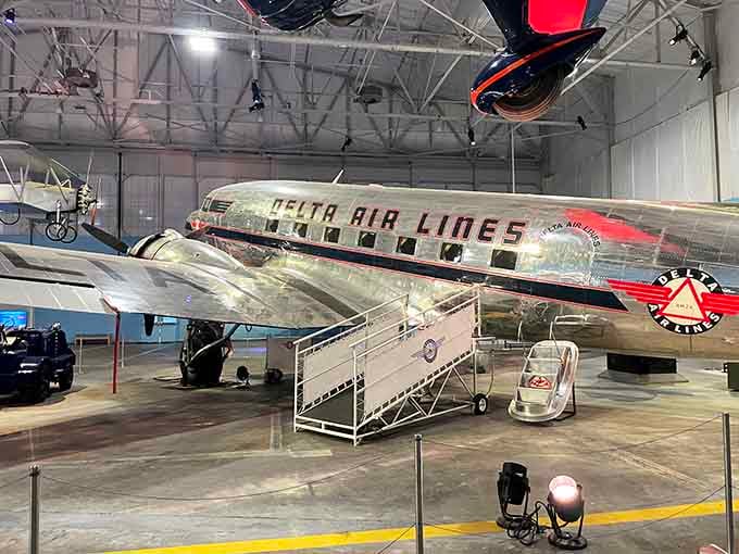 Standing beneath this vintage Delta aircraft feels like stepping into your grandparents' photo album, but way cooler.