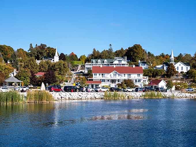 Ephraim's harbor glows like a painting, with church steeples and autumn colors perfectly framed by calm blue water.